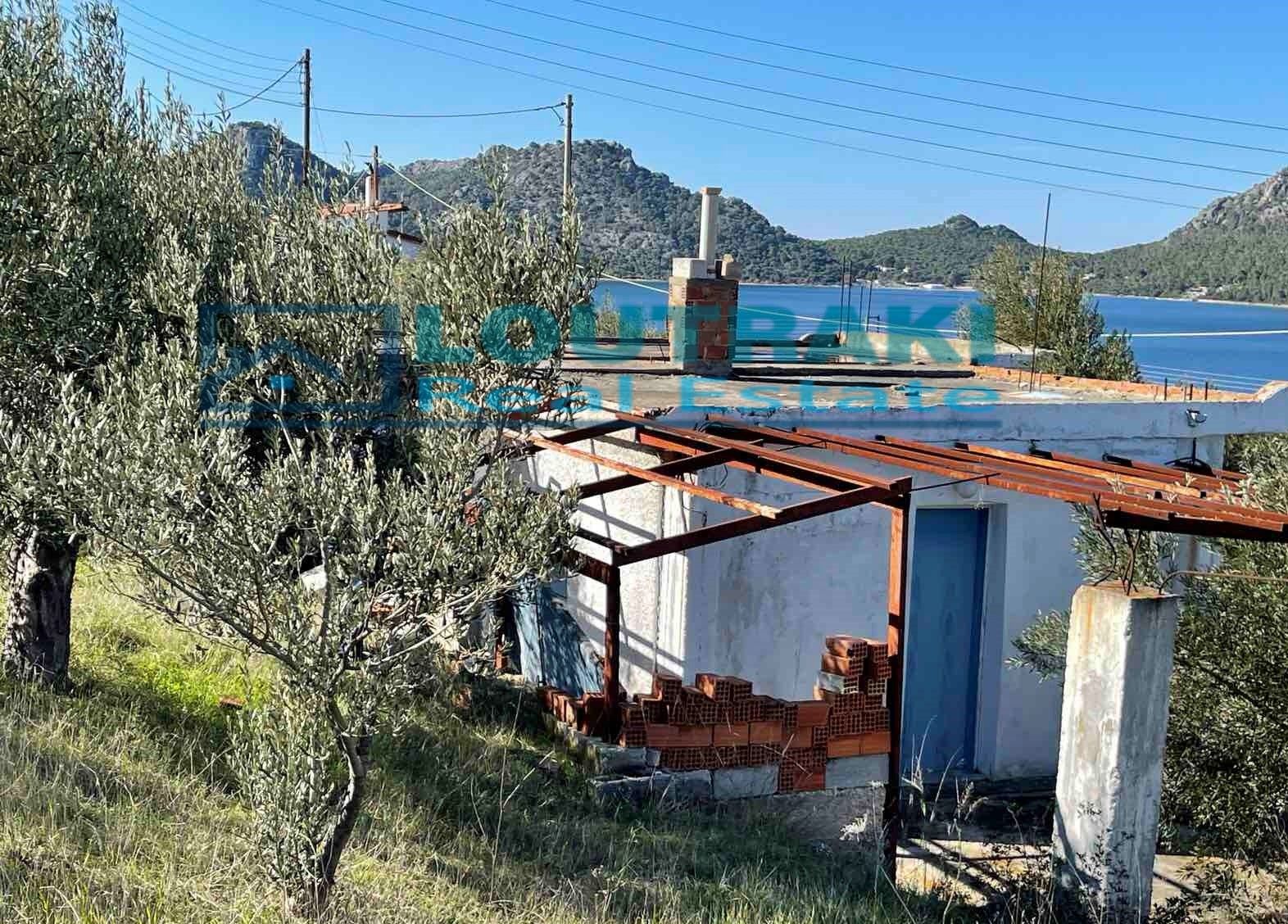 ΟΙΚΟΠΕΔΟ ΜΕ ΜΟΝΟΚΑΤΟΙΚΙΑ ΣΤΗ ΒΟΥΛΙΑΓΜΕΝΗ ΠΕΡΑΧΩΡΑΣ - Loutraki Real Estate