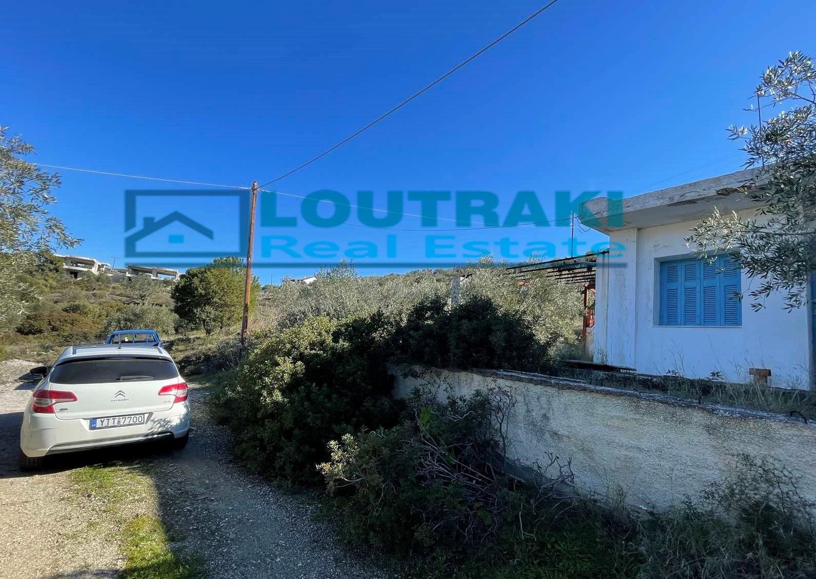 ΟΙΚΟΠΕΔΟ ΜΕ ΜΟΝΟΚΑΤΟΙΚΙΑ ΣΤΗ ΒΟΥΛΙΑΓΜΕΝΗ ΠΕΡΑΧΩΡΑΣ - Loutraki Real Estate